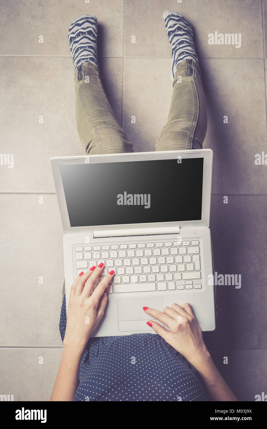 Young woman using modern white computer. Top view Stock Photo - Alamy