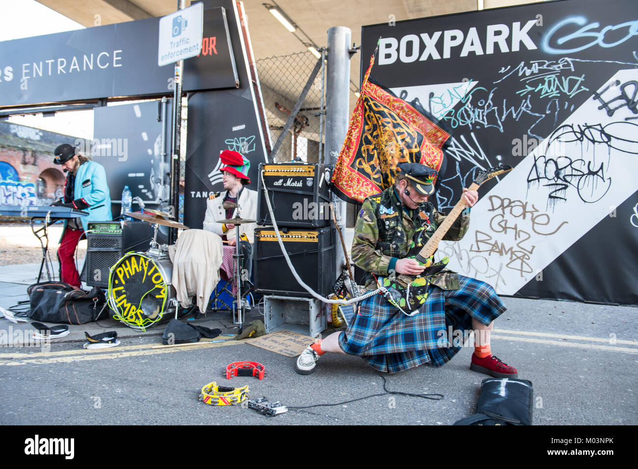 Phantom Limbs band playing outside Shoreditch Station Stock Photo - Alamy