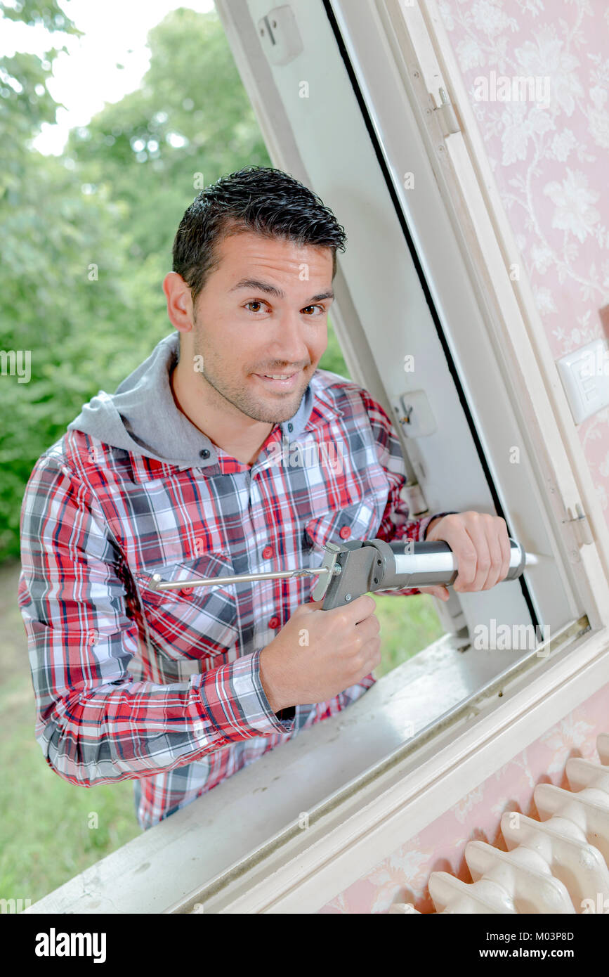 Installing a new window Stock Photo - Alamy
