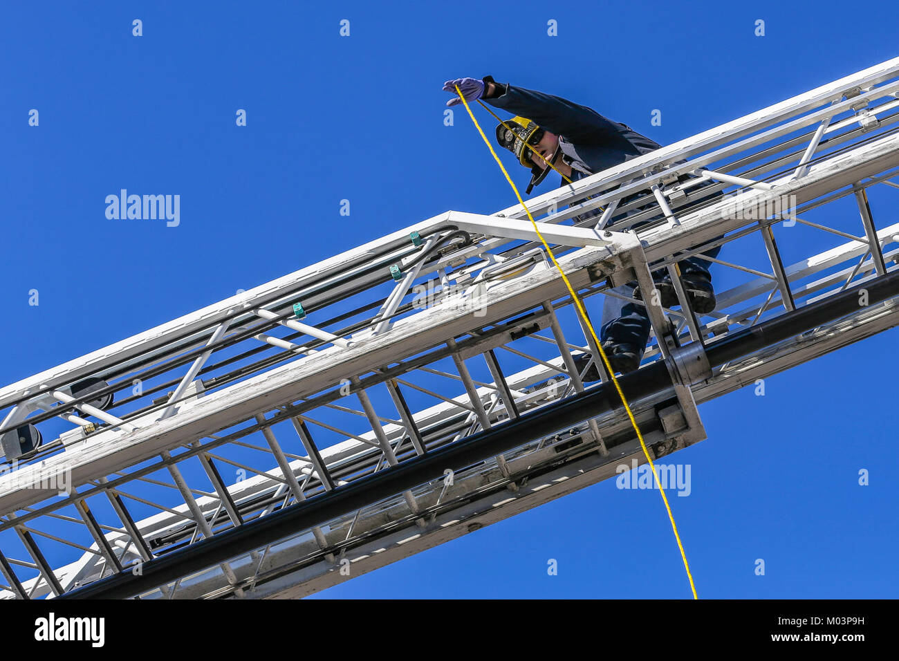 Aerial ladder trucks hi-res stock photography and images - Alamy