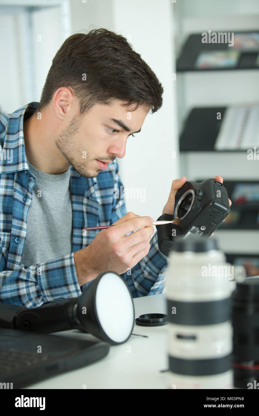 Man cleaning repairing digital hi-res stock photography and images - Alamy