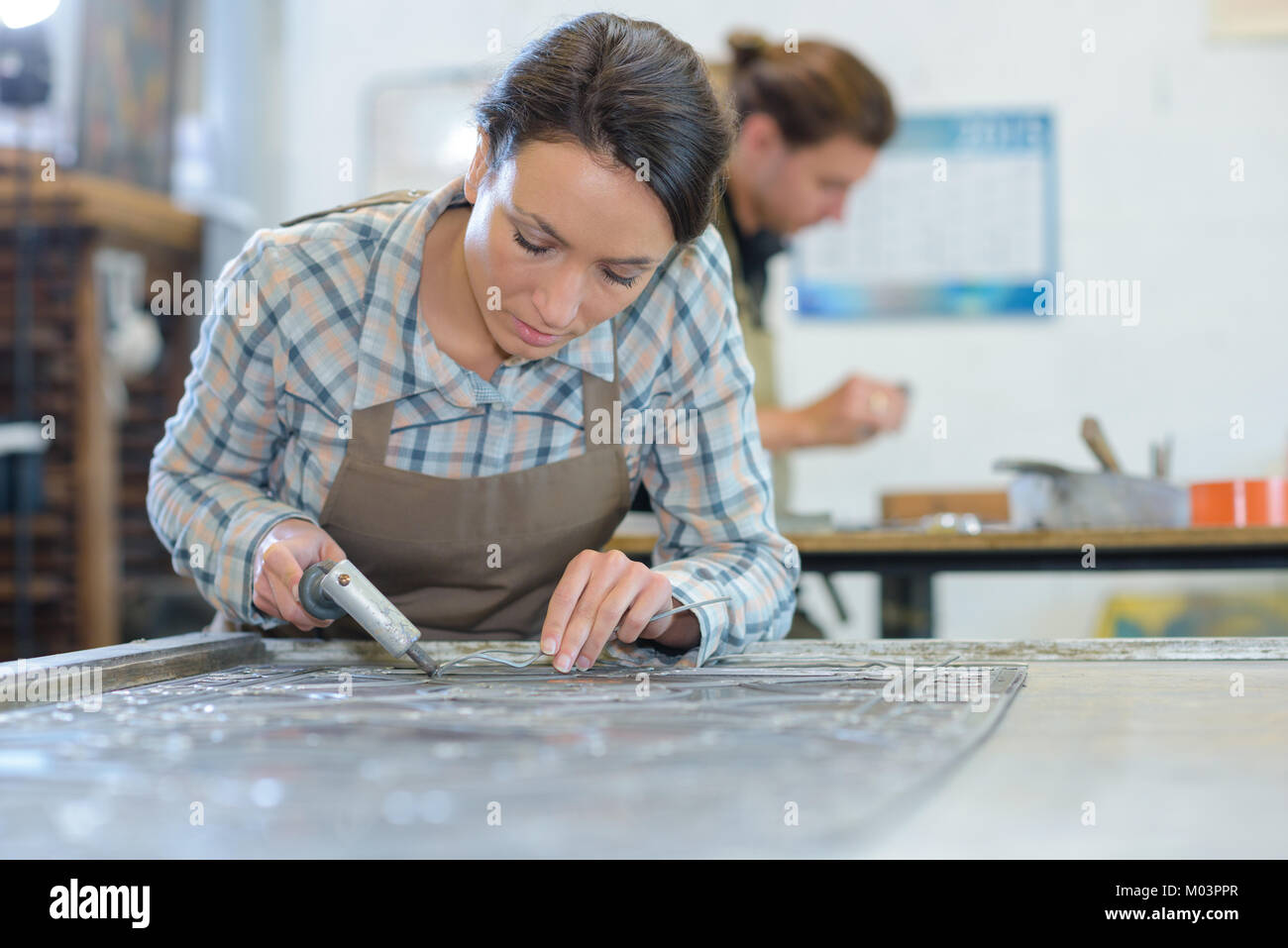 making the glass panel Stock Photo - Alamy