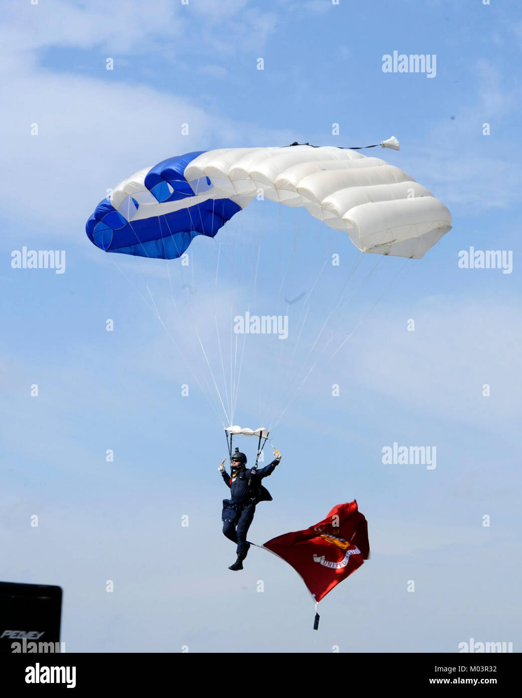 A member of the U.S. Air Force Academy's Parachute Team “Wings of Blue ...