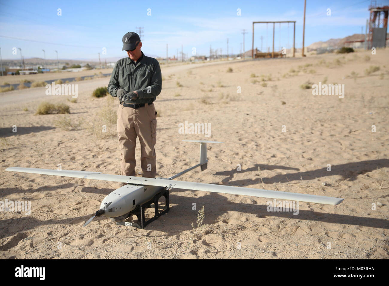 Daniel Lloyd, Lockheed Martin Skunk Works, prepares the unmanned air ...