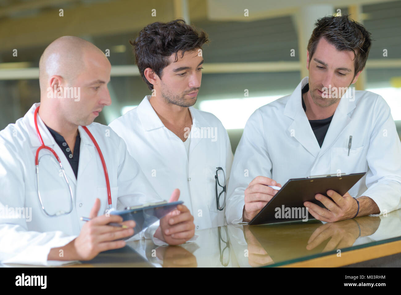 male doctors talking Stock Photo - Alamy