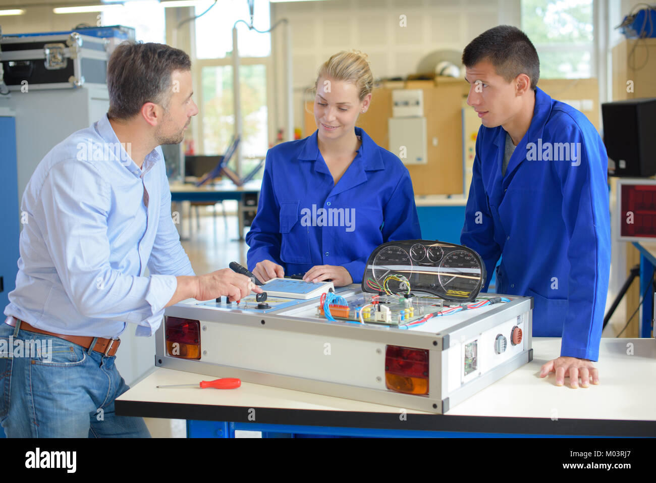 working with electricity Stock Photo - Alamy