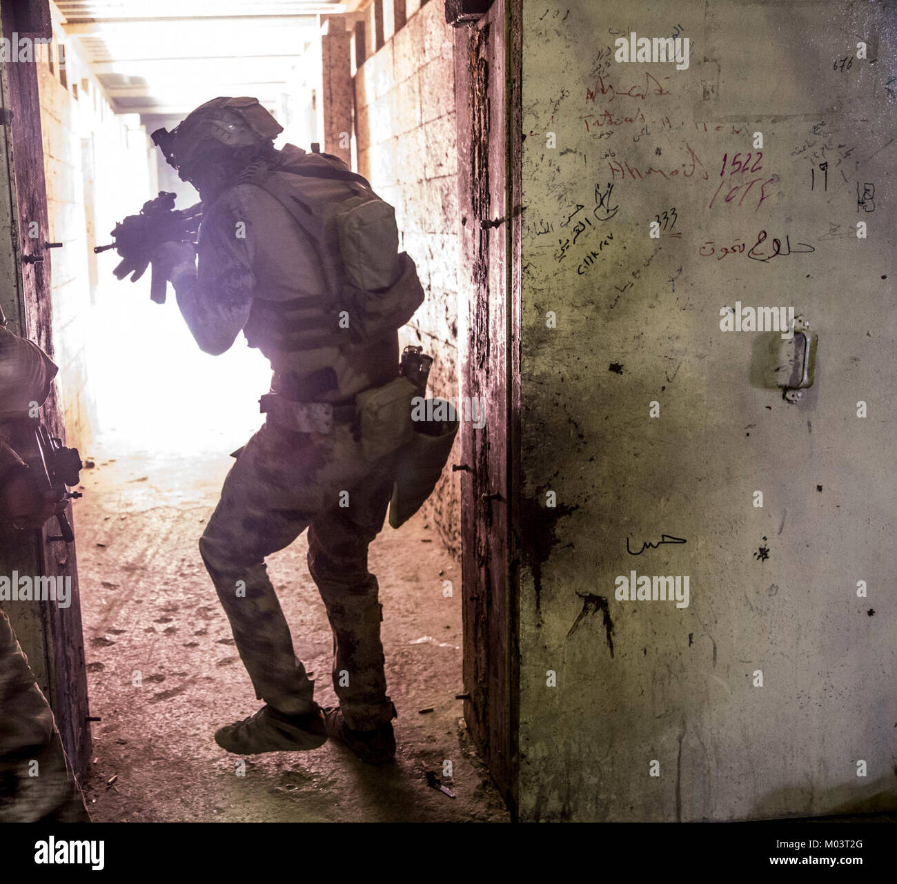 An Advanced Operators Training Course student enters a room and looks ...