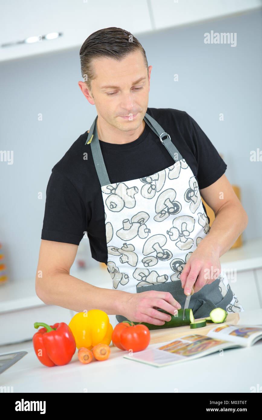 chef man cooking in the kitchen Stock Photo - Alamy