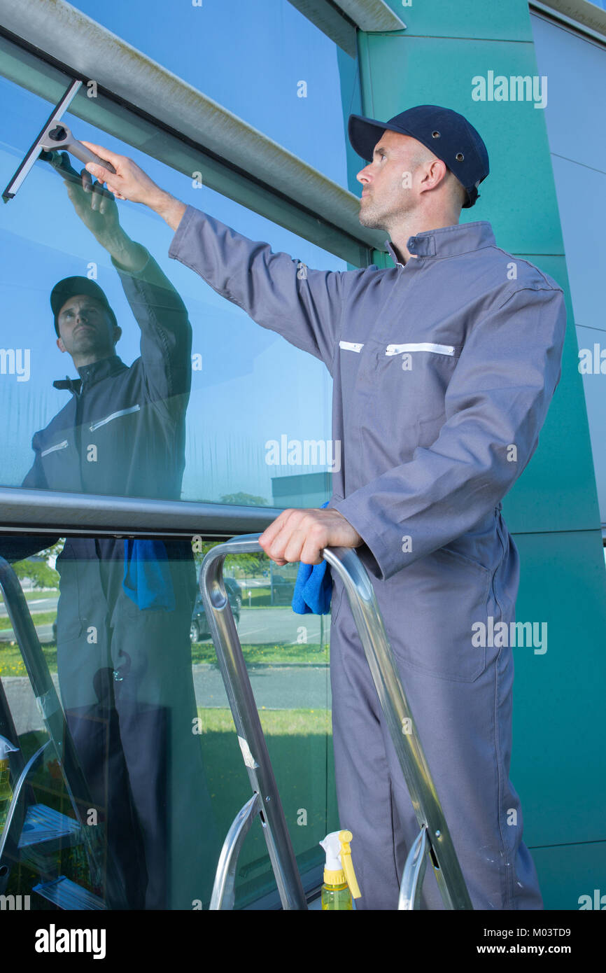 man window cleaner worker Stock Photo - Alamy