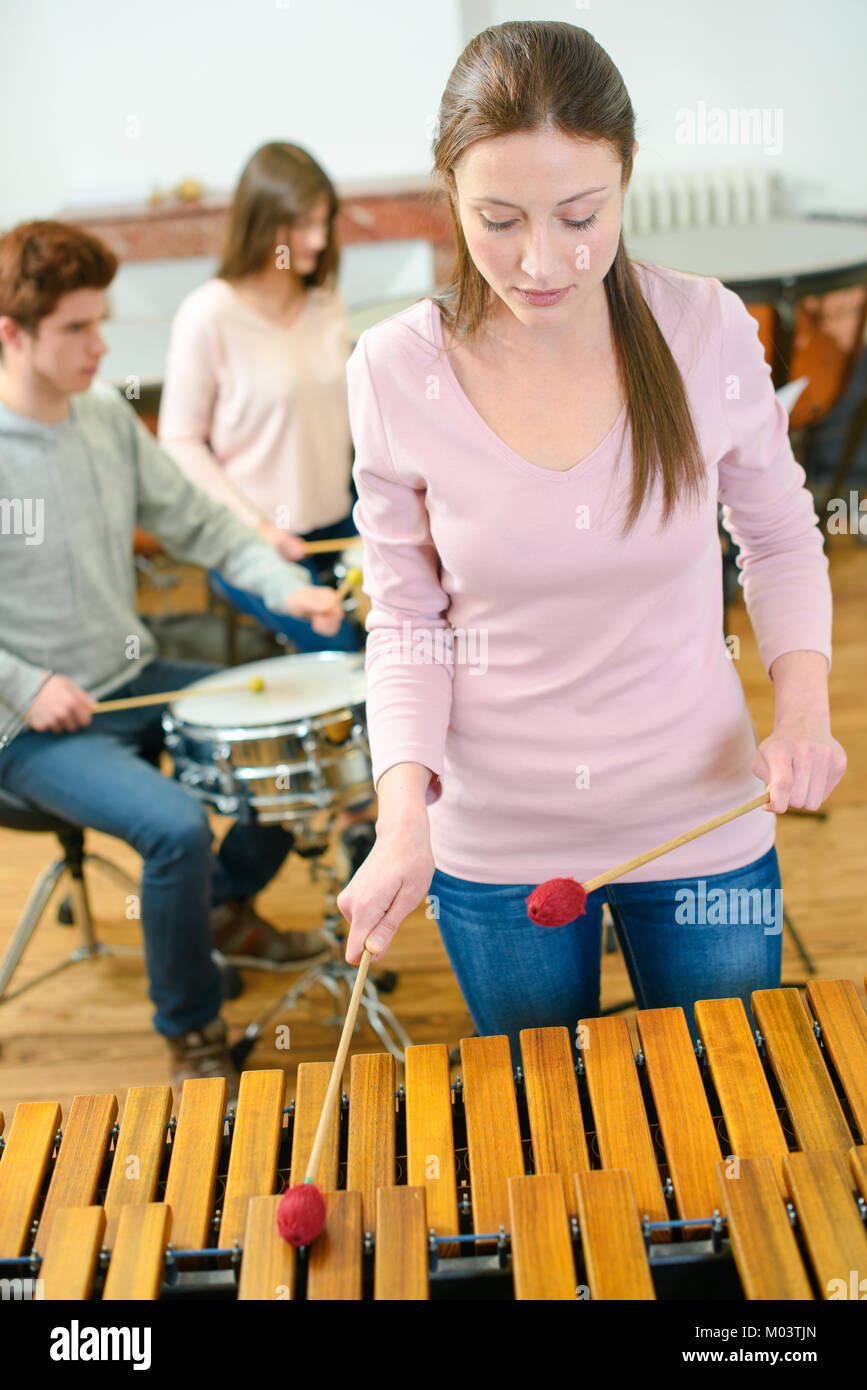 woman playing wooden xylophone Stock Photo - Alamy