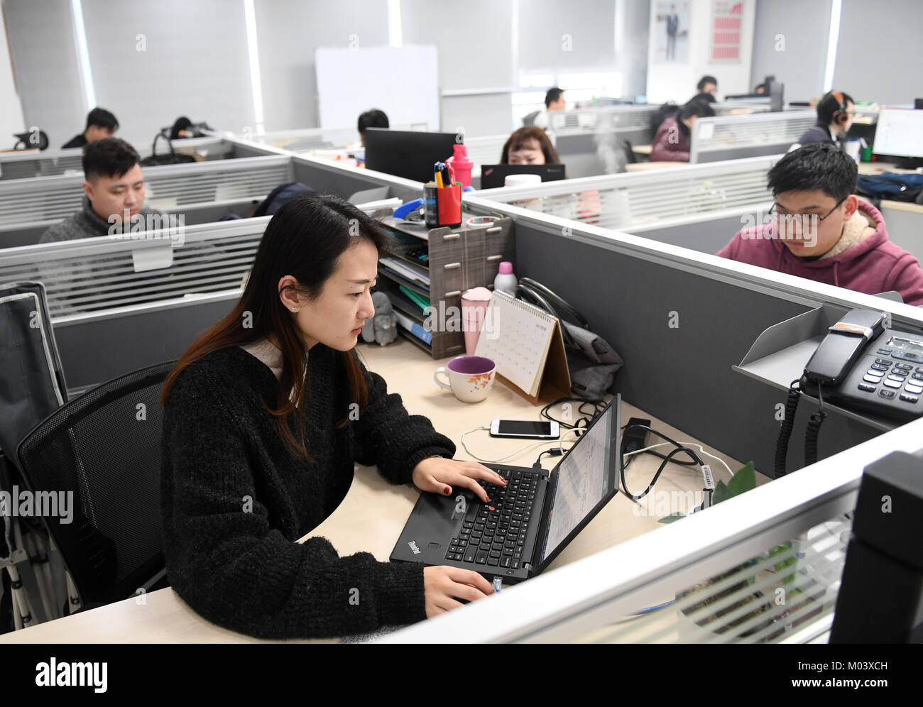 Nanning. 15th Jan, 2018. Staffs work at China-ASEAN Information Port in ...