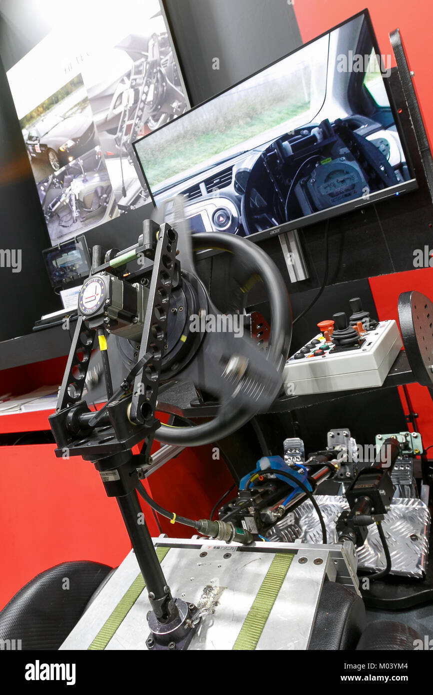 A self-driving car system simulator performs during the Automotive ...