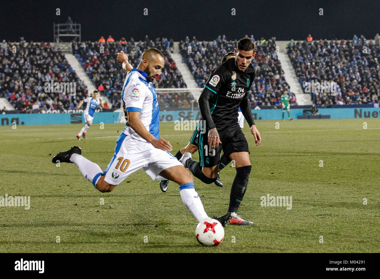 Marco Asensio (Real Madrid) drives forward on the ball Nabil El Zhar ...