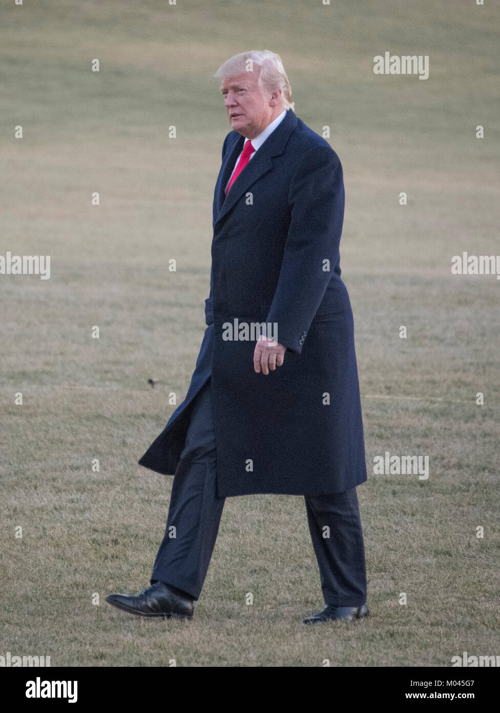 United States President Donald J. Trump walks on the South Lawn as he ...