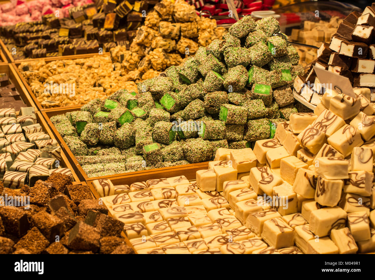 sweet food and candy on the market Stock Photo - Alamy