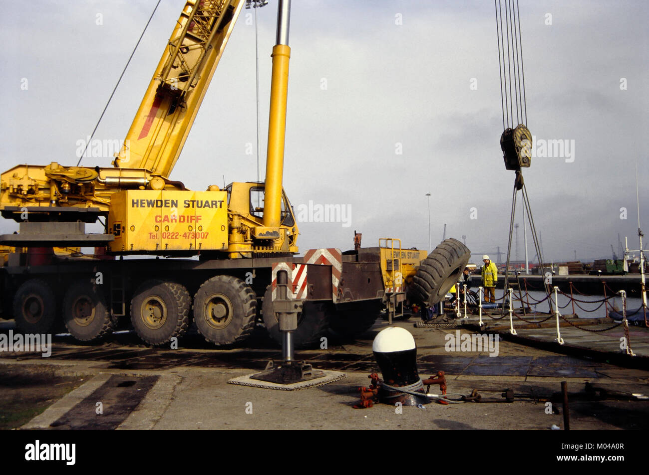 Civil engineering, heavy lifting mobile crane. Repairing lock gates ...