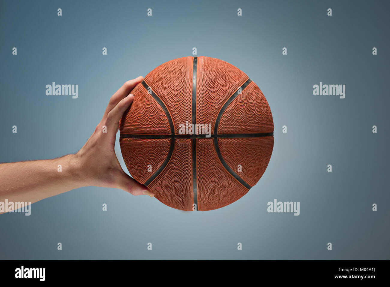 Adult hand holding ball hi-res stock photography and images - Alamy