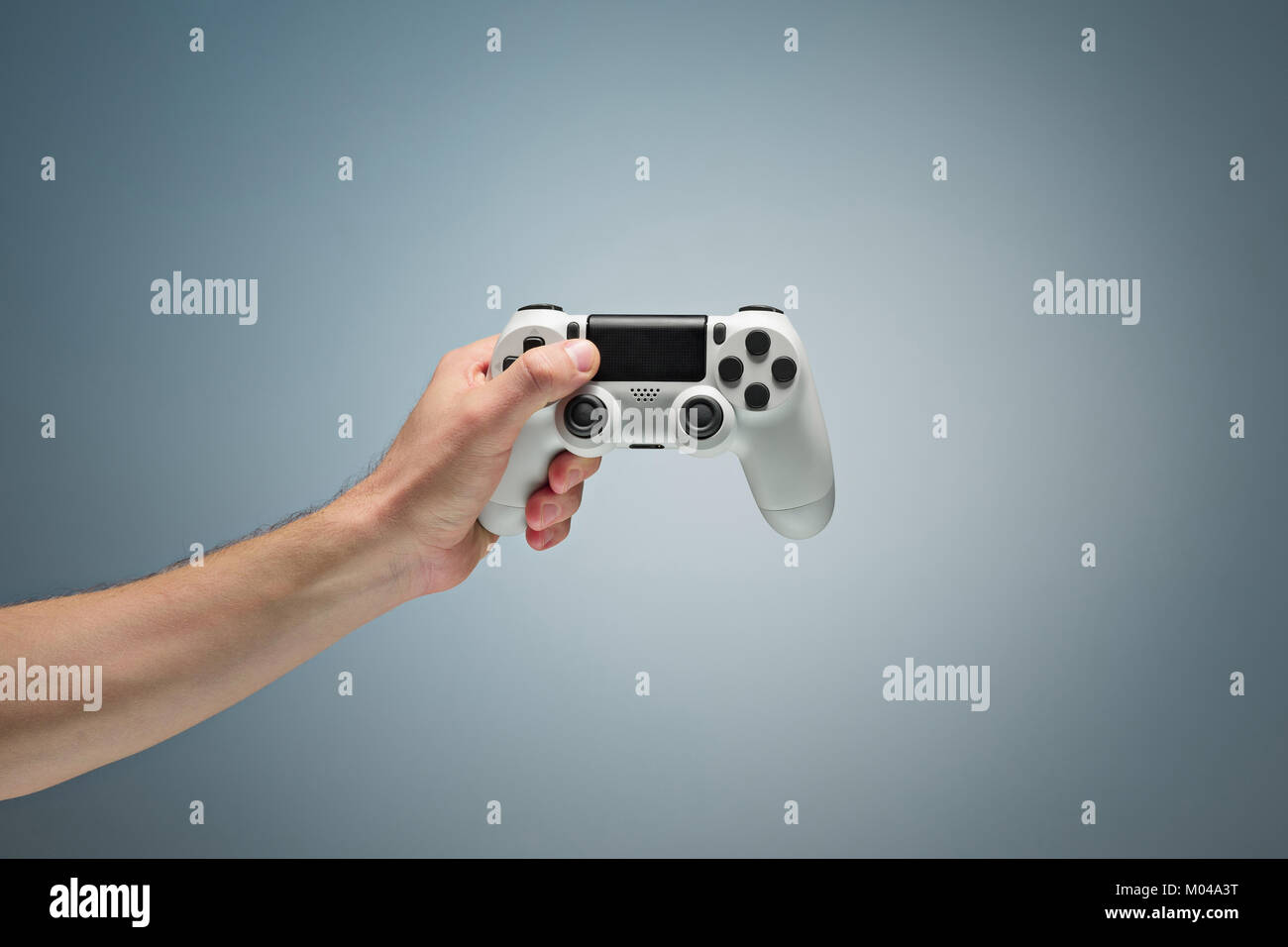 Male Hands Holding Gamepad Stock Photo - Alamy