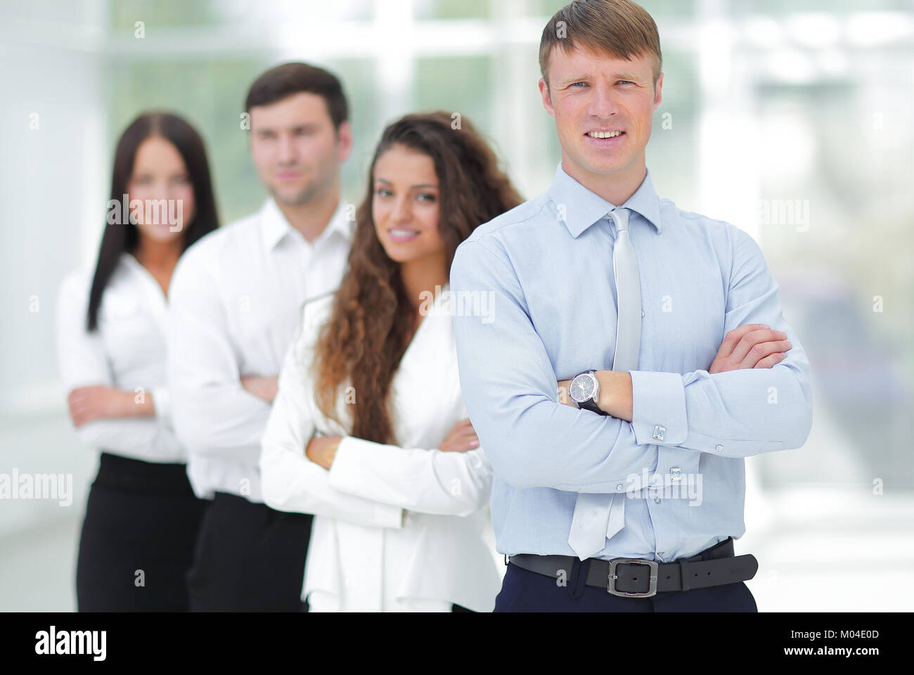 leader at the head of the business team Stock Photo - Alamy