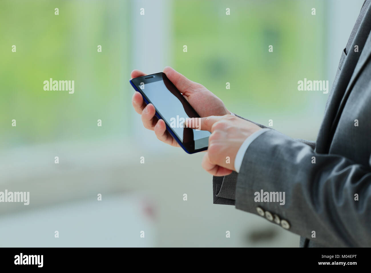 man using mobile phone Stock Photo - Alamy