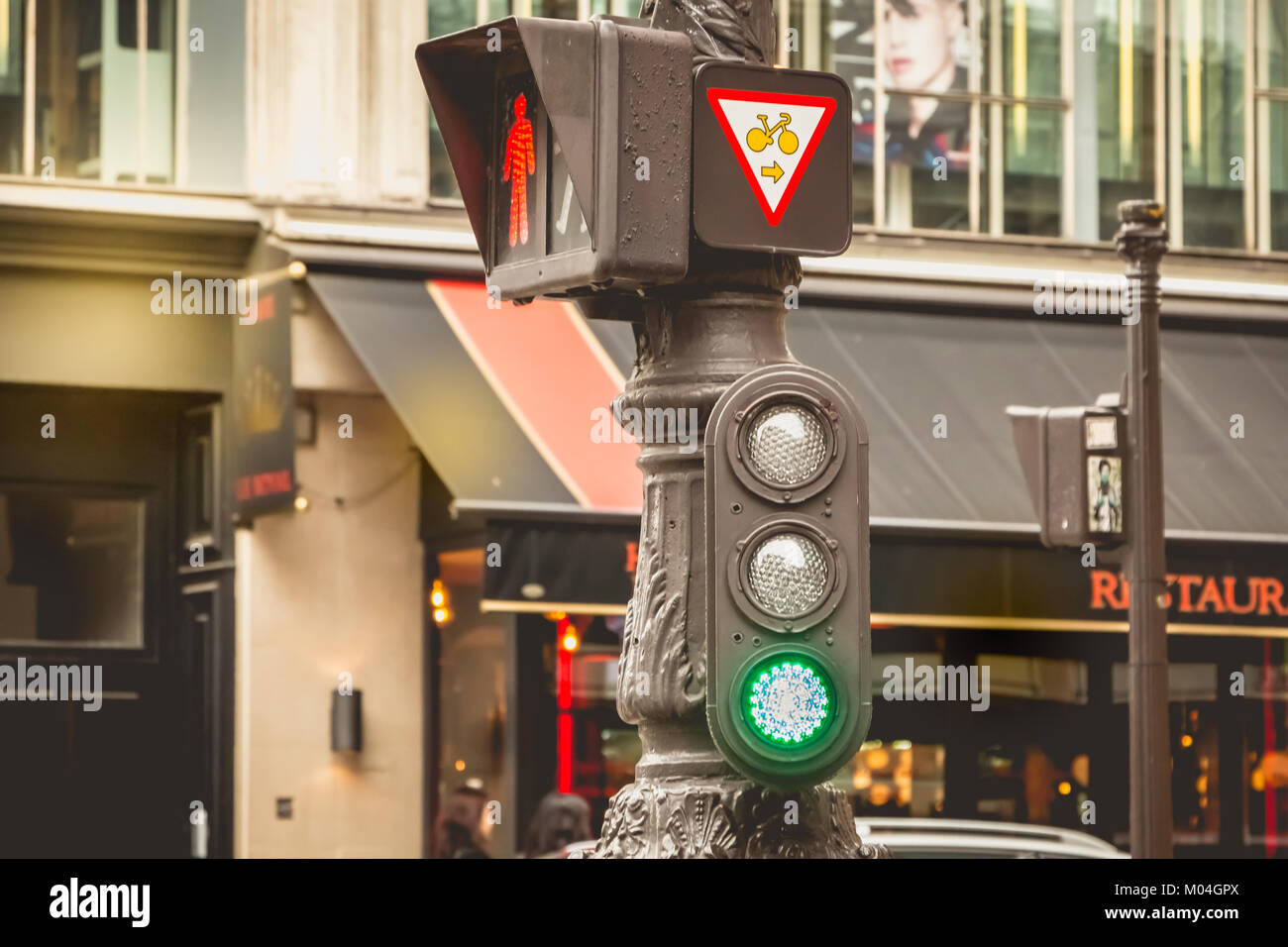 PARIS, FRANCE - May 08, 2017 : typical red traffic light in a Paris ...