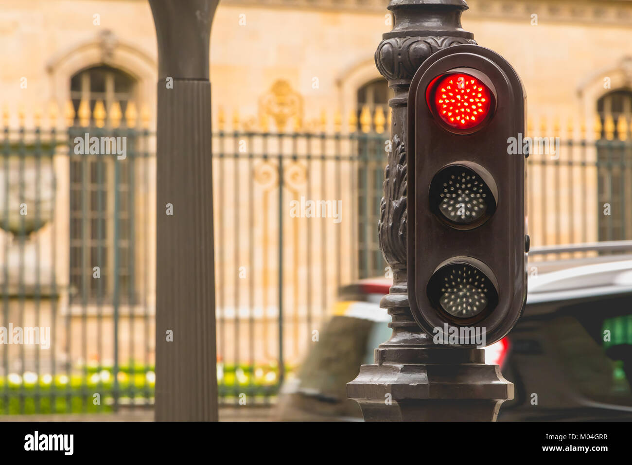 PARIS, FRANCE - May 08, 2017 : typical red traffic light in a Paris ...