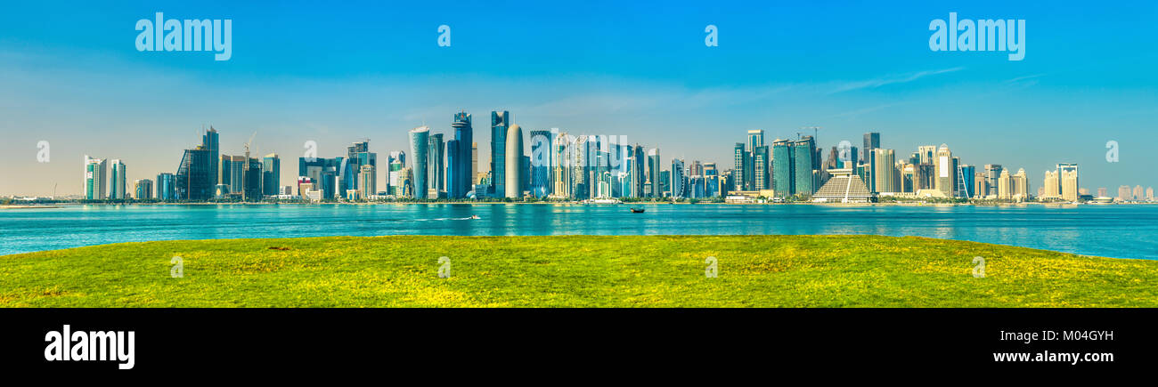 Panorama of Doha with green grass. The capital of Qatar Stock Photo - Alamy