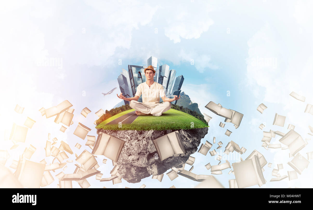 Young man keeping mind conscious Stock Photo - Alamy