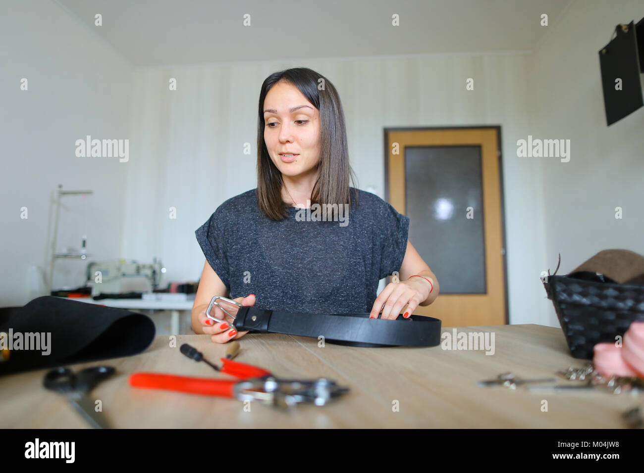 young designer making women bags for sale Stock Photo - Alamy