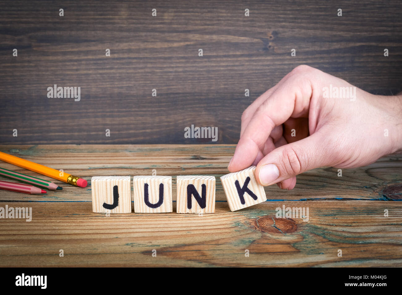 junk. Wooden letters on the office desk, informative and communication ...
