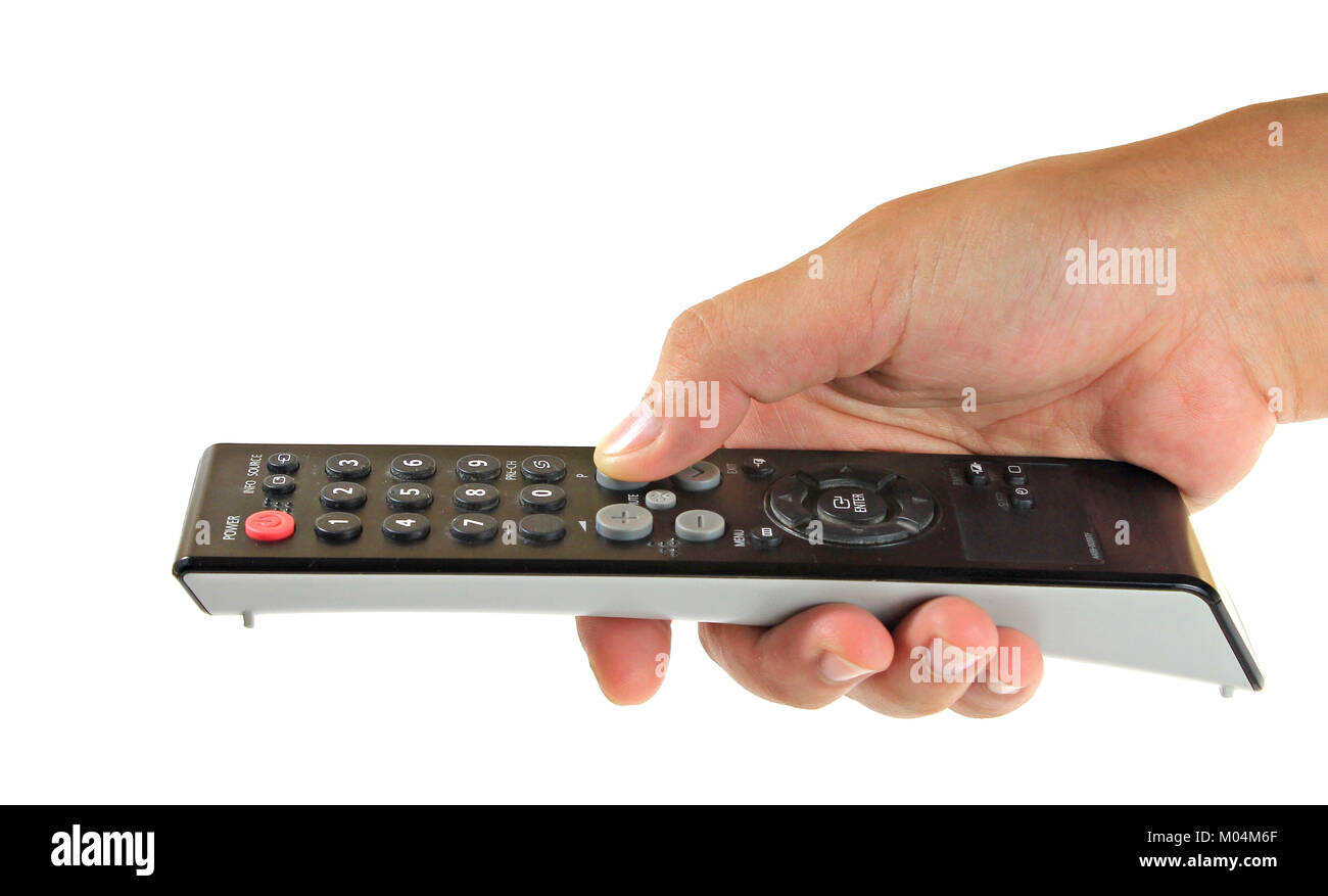 Remote in a hand on the white Stock Photo - Alamy