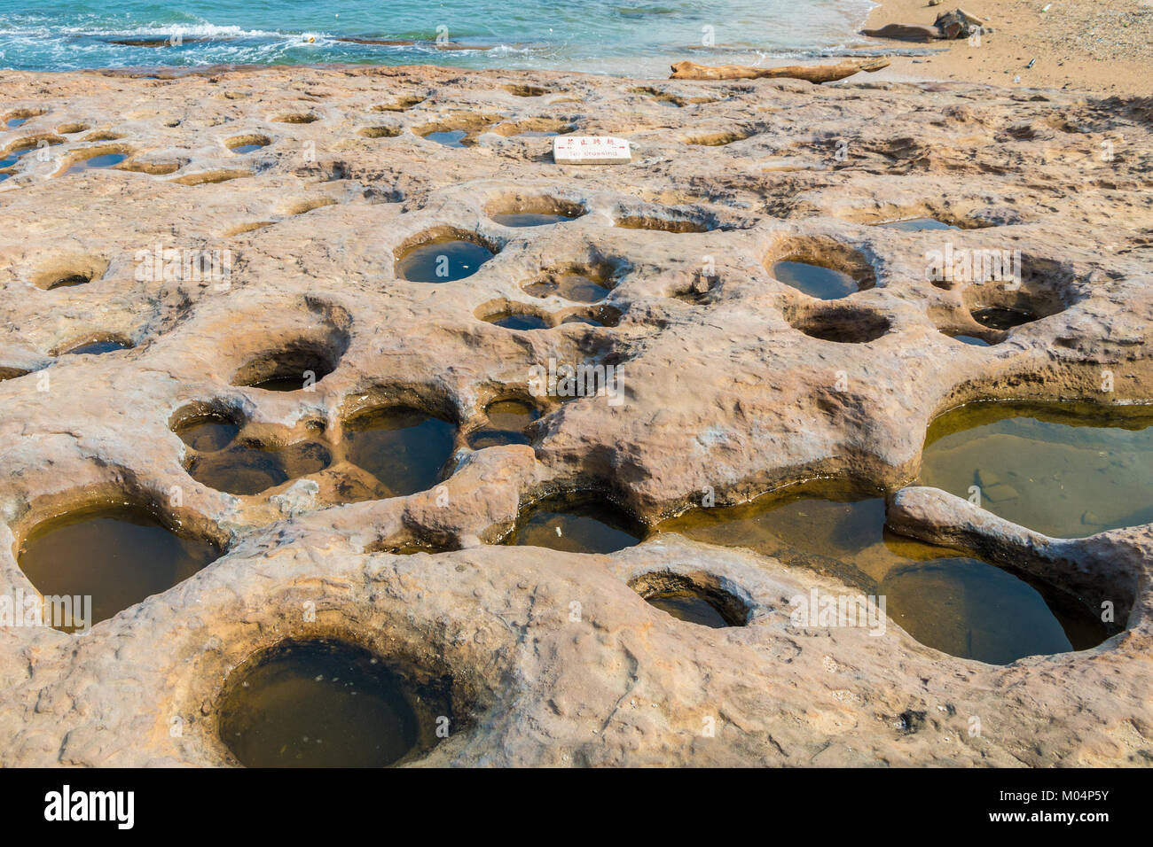 A stretch full of ocean eroded potholes that were formed as a result of ...