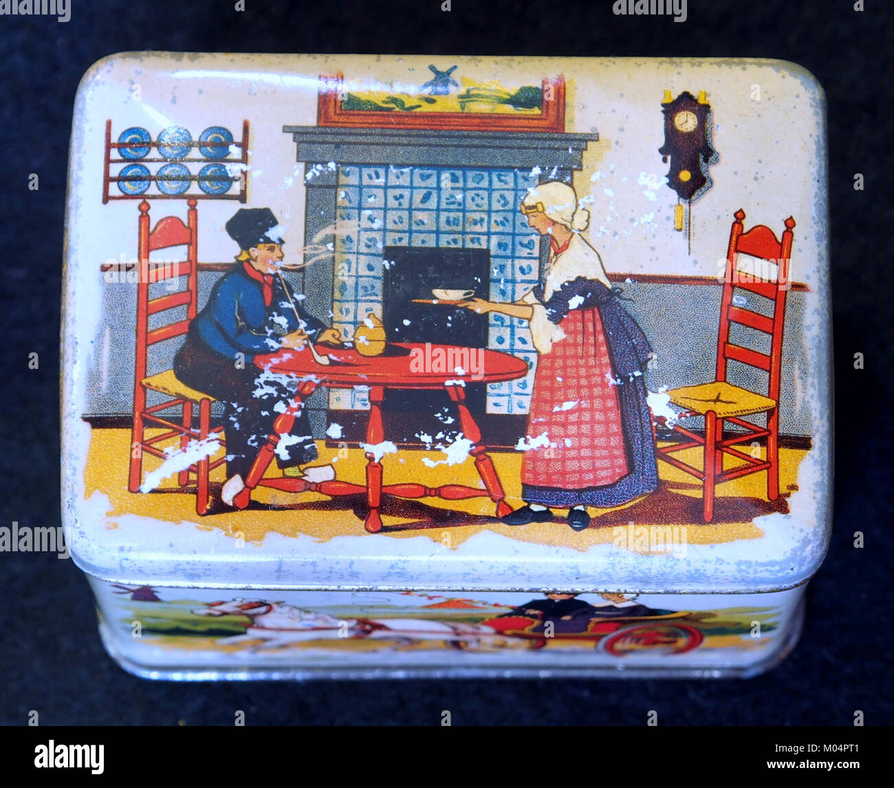 This image features a vintage tin from the De Zaan Cocoa and Chocolate ...