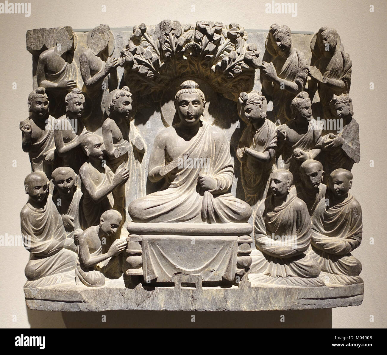 This Gandharan sculpture, dating from the 2nd-3rd century AD, depicts ...