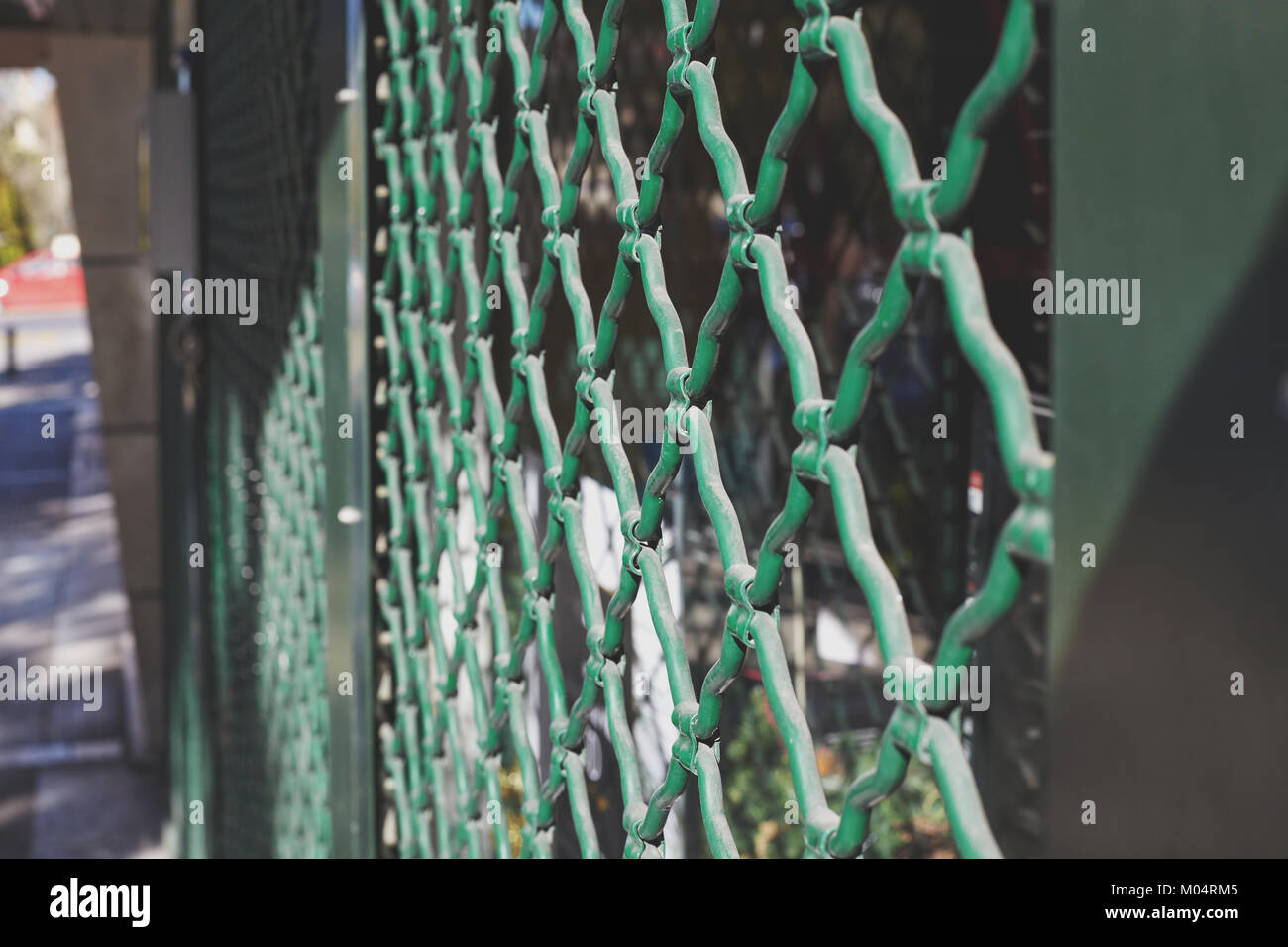 Metal gate protecting a store. Close shop Stock Photo - Alamy