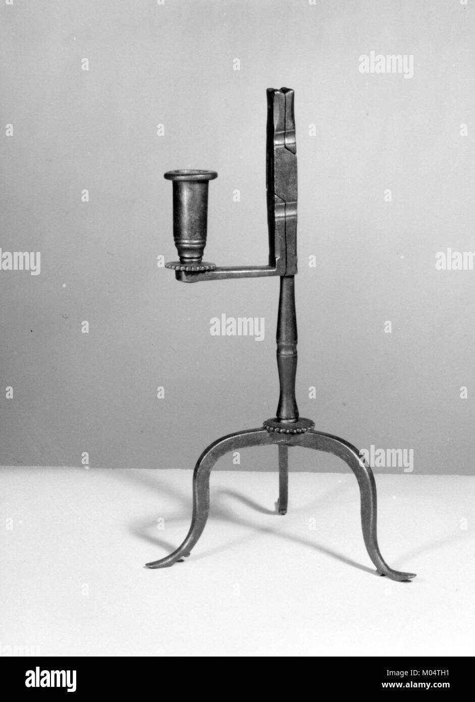 This candlestick and rushlight holder, housed at the Metropolitan ...