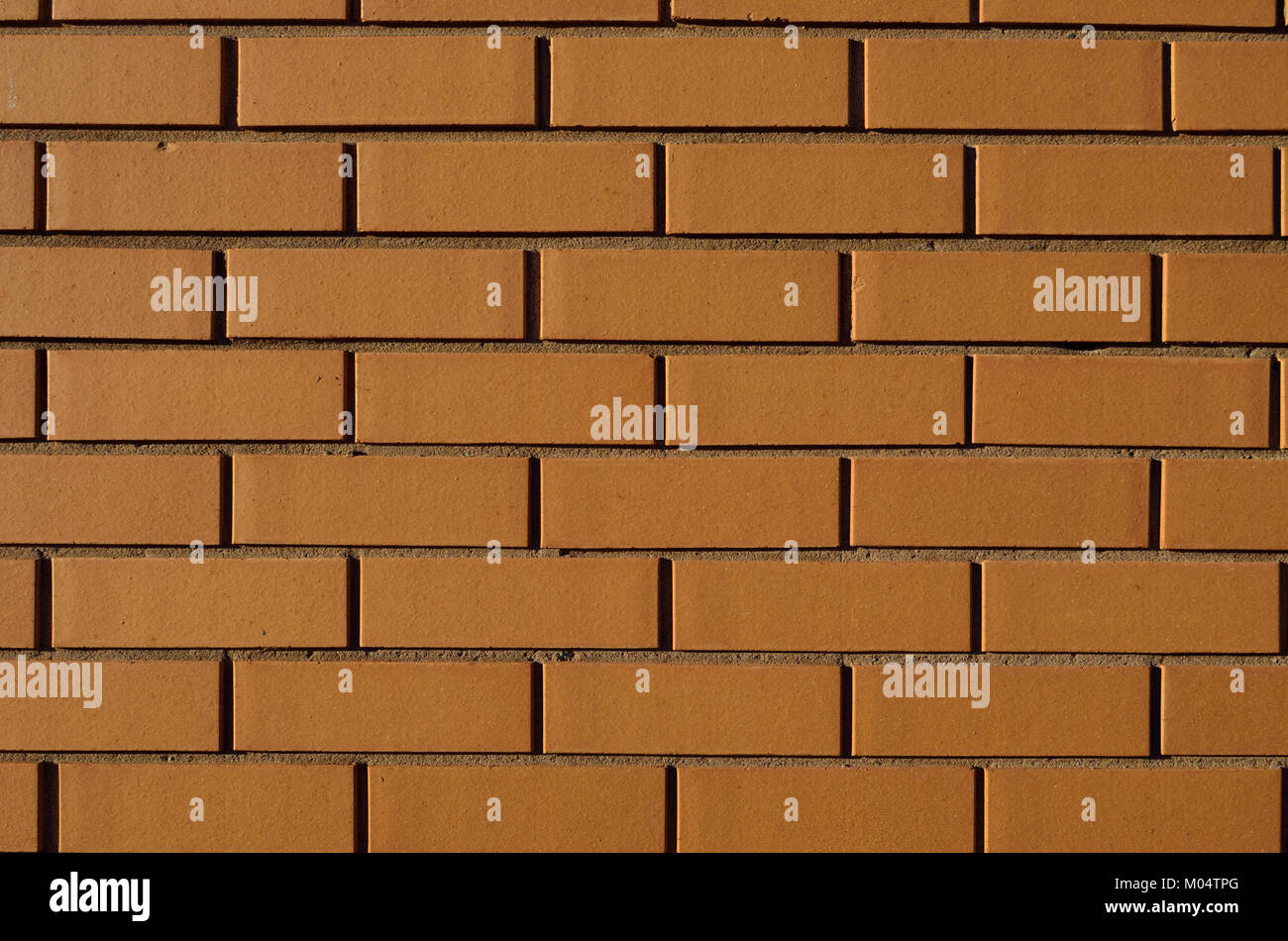 A photograph of a traditional brick wall, showcasing the construction ...