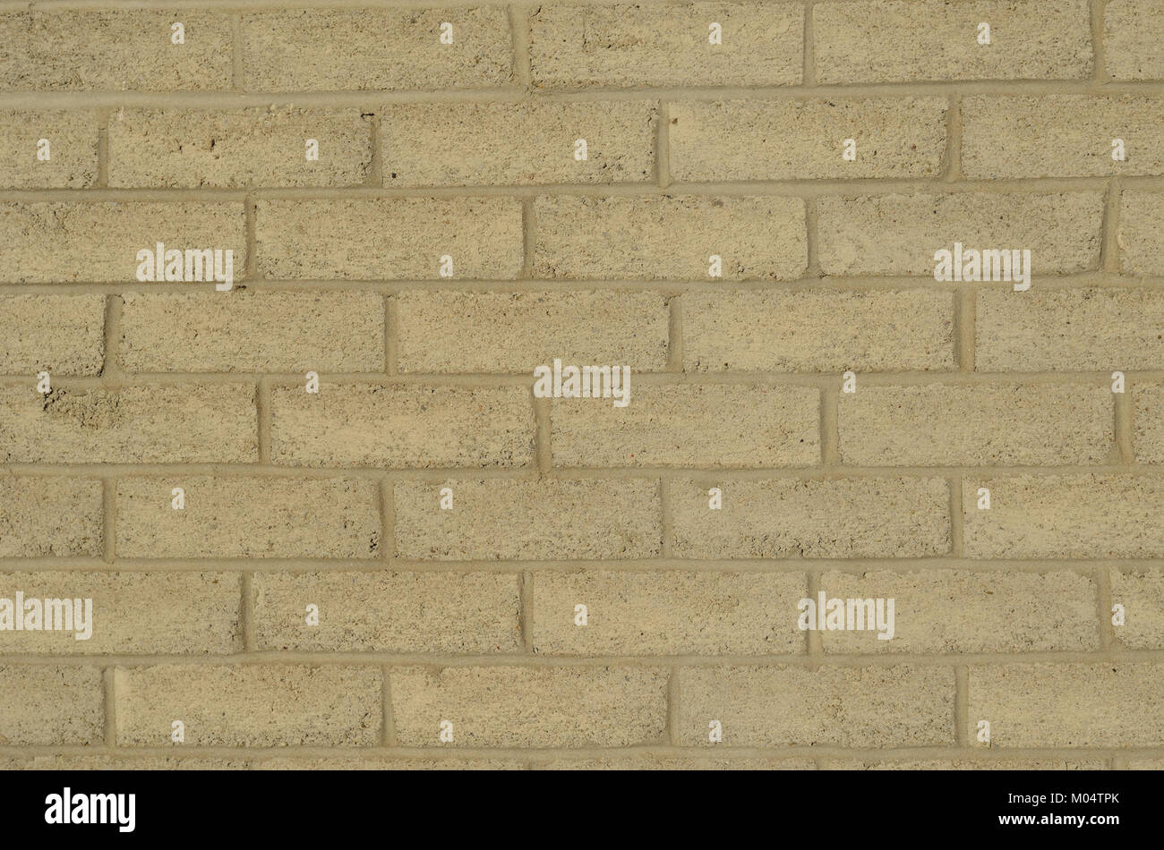 This brick wall showcases traditional masonry techniques, demonstrating ...