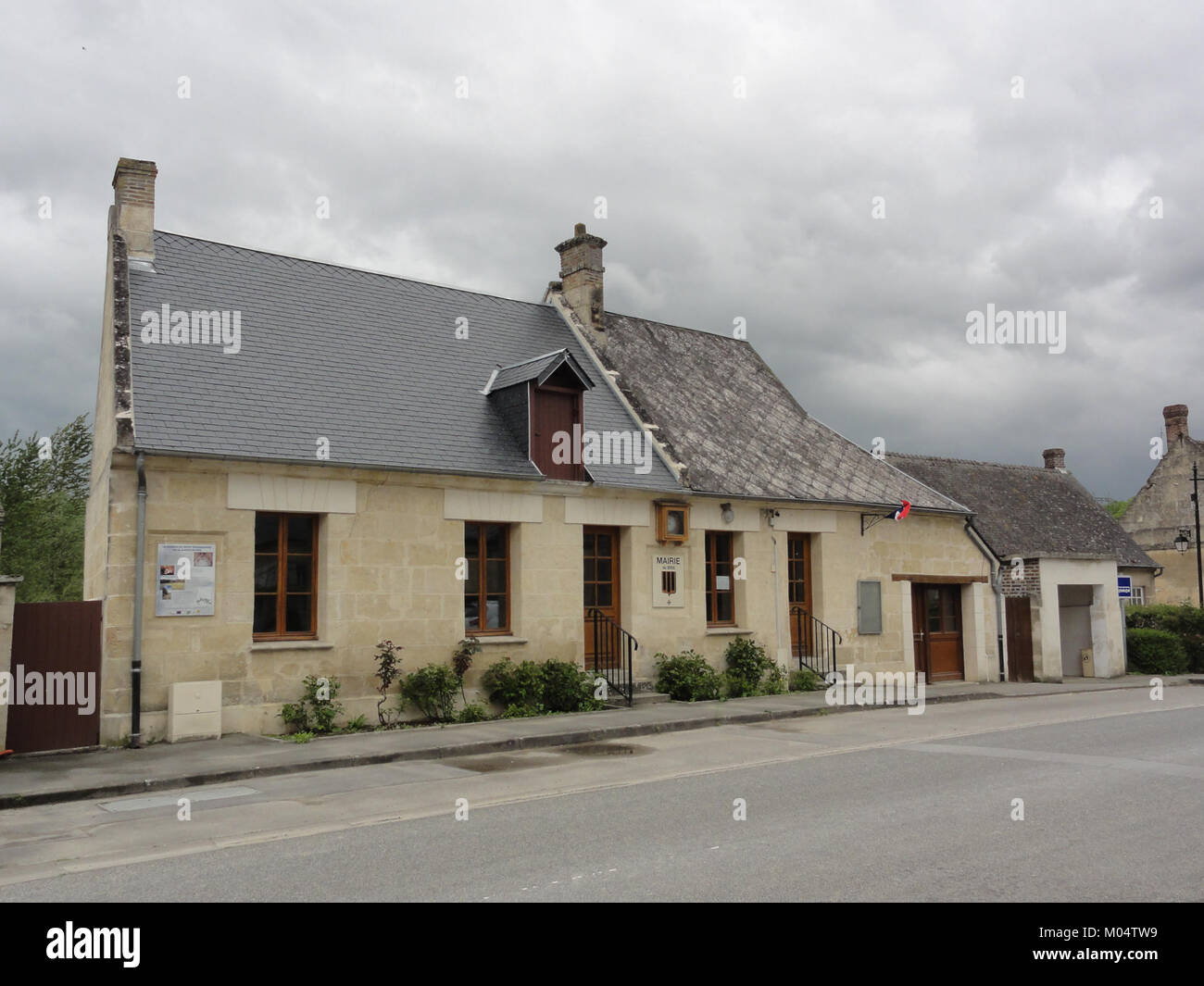 This image depicts the town hall in Brie, Aisne, France. The building ...