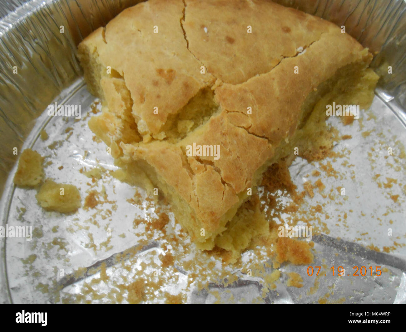 The cross section of a butter cake reveals its moist, dense texture and ...