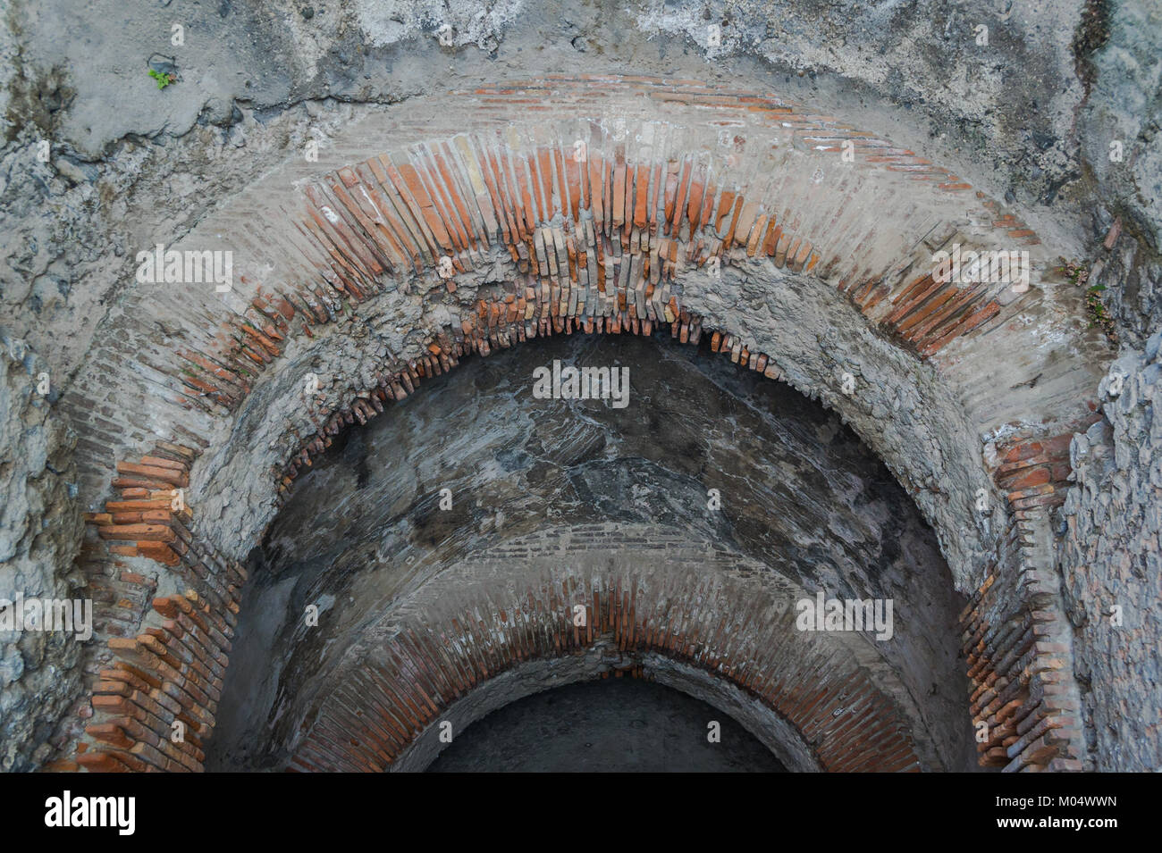 The brick vaults of the entrance to the amphitheatre at Pompeii are ...