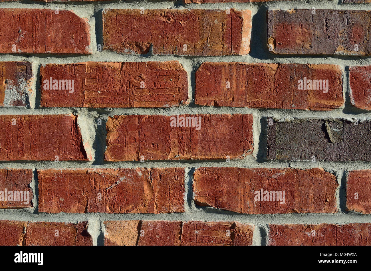 This image of a brick wall features classic masonry construction using ...