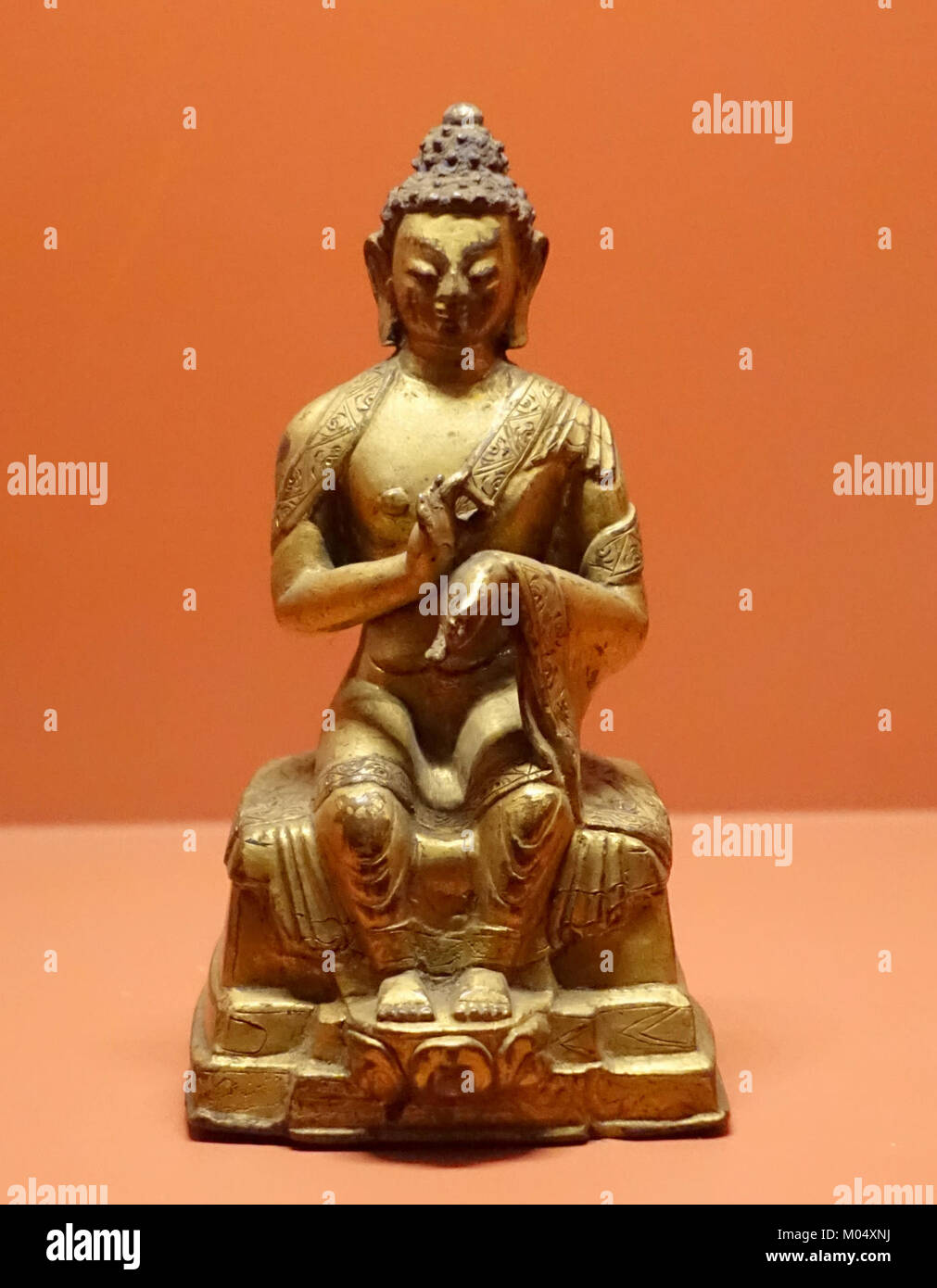 This gilt copper statue of Buddha from Tibet, currently housed in the ...