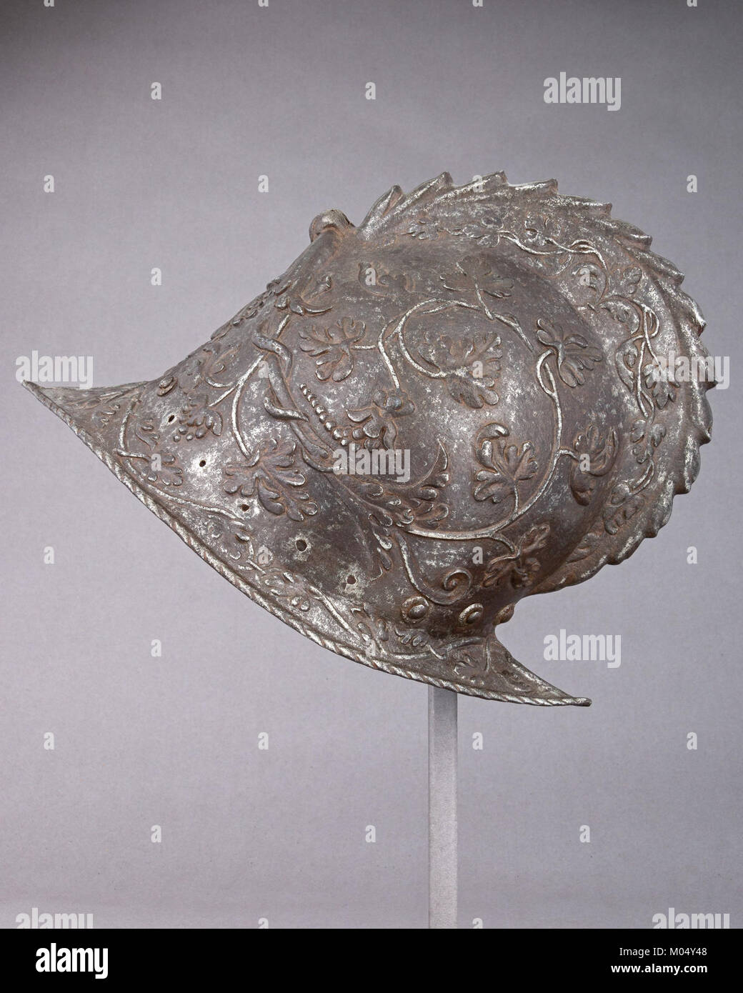 This is a historical piece of armor, a Burgonet helmet, part of the MET ...