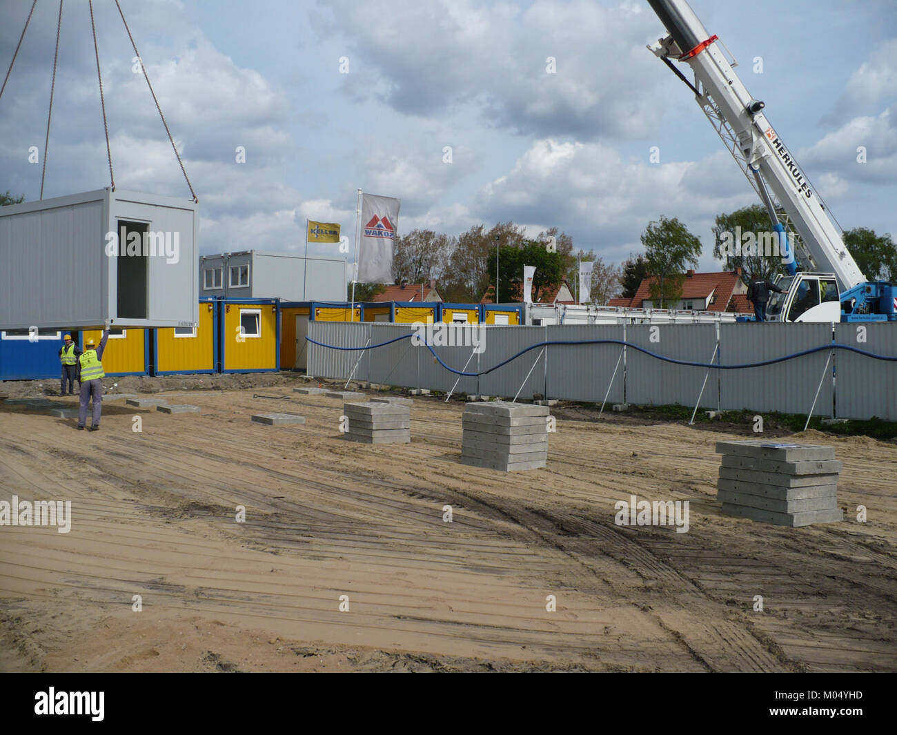 A container being constructed for various purposes, highlighting modern ...