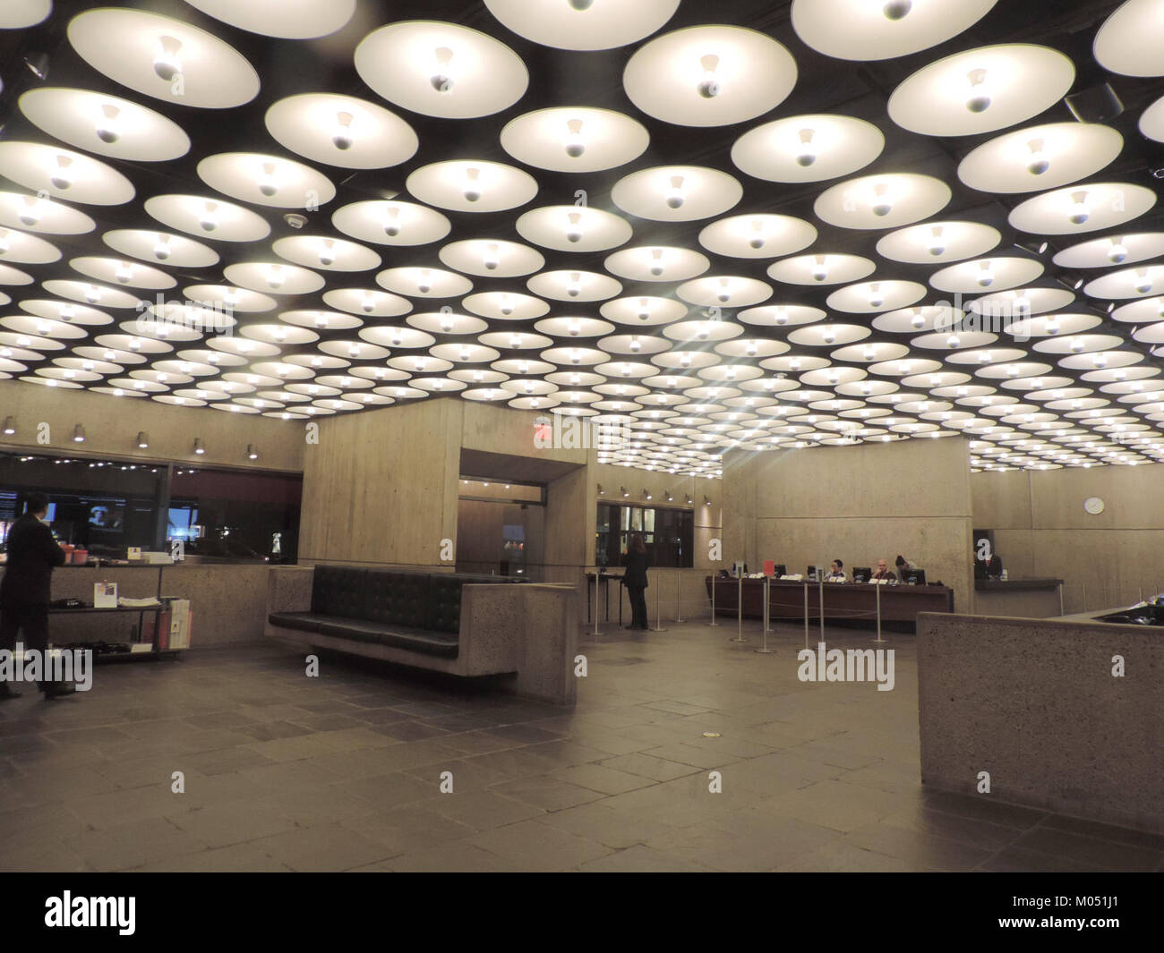 A photograph of the lobby exit of a building designed by architect ...
