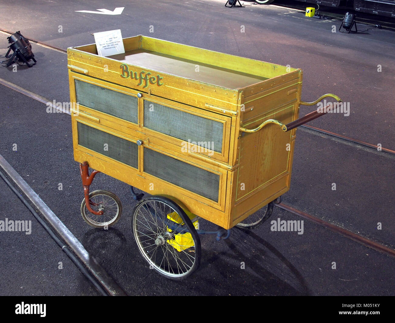 This image depicts a buffet cart, a fixture in train dining cars ...