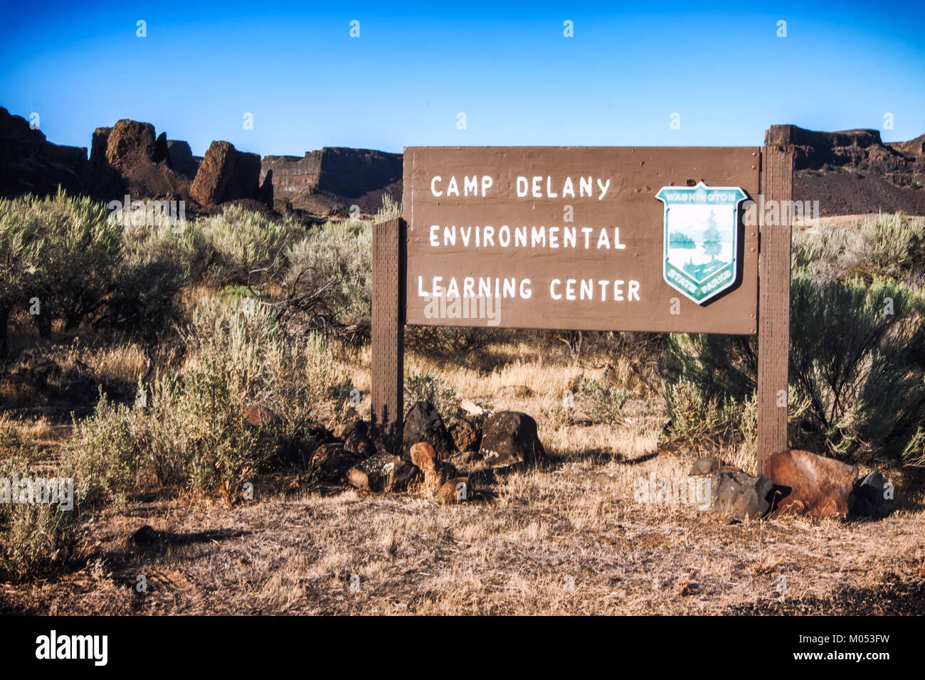 The sign for Camp Delany Environmental Learning Center marks the ...
