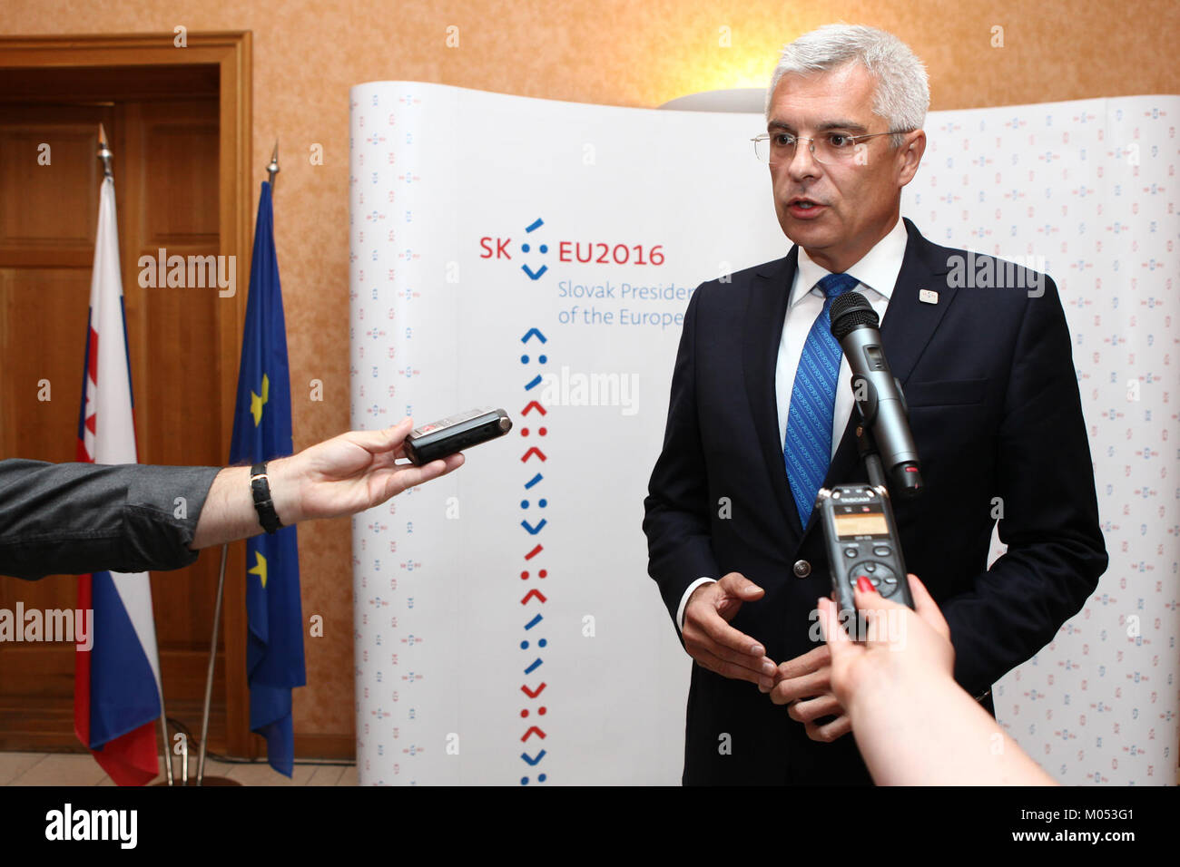 This image captures a briefing by State Secretary I. Korcok after the ...
