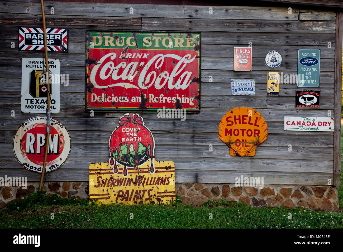 Retail Advertising Tin Signs Stock Photo - Alamy